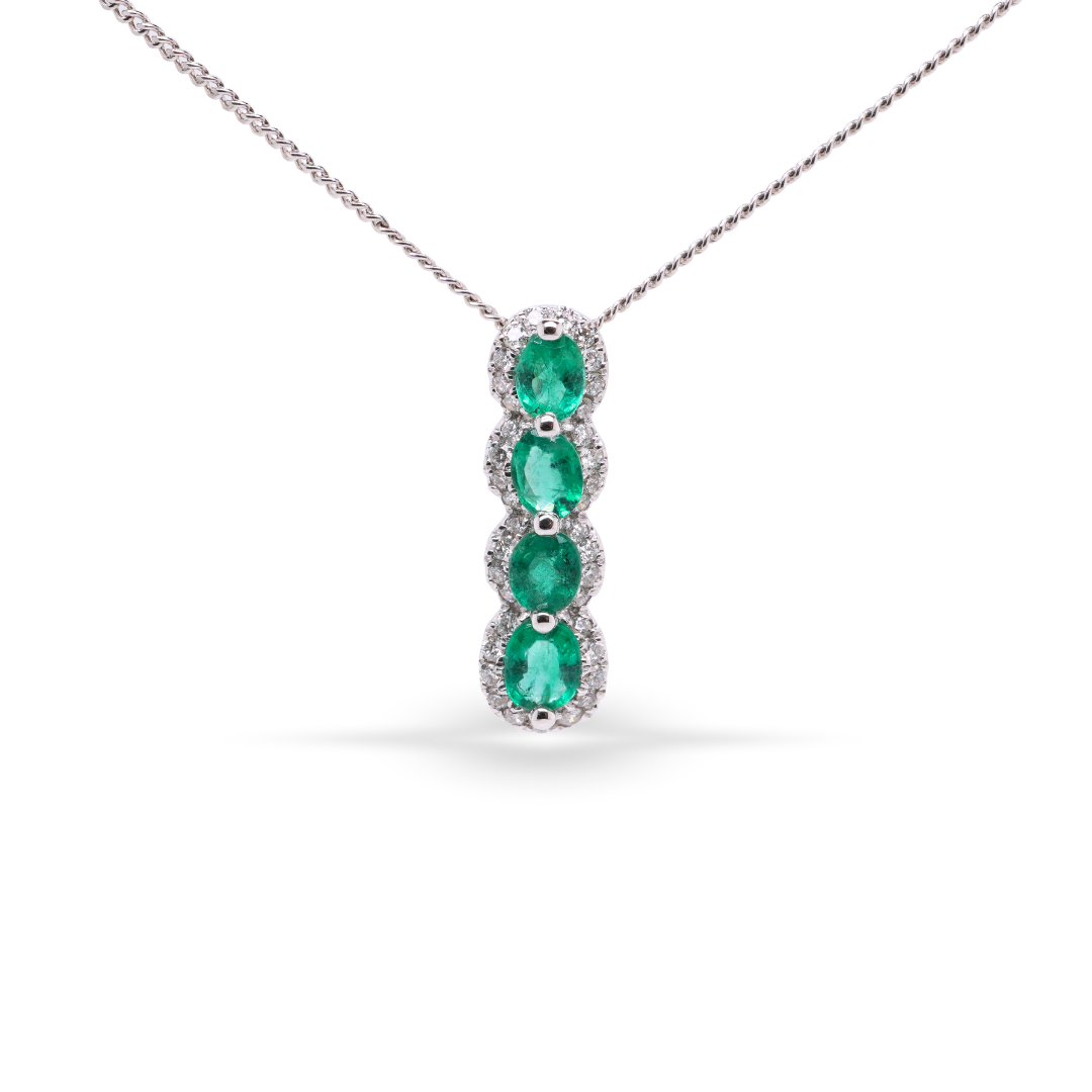 Elongated Vertical Oval Shaped Pendant With Emeralds – Omni Jewelcrafters